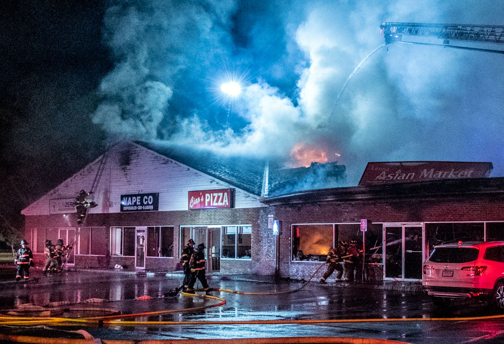 Traffic gridlock, fast-moving flames, burning power lines challenge ...